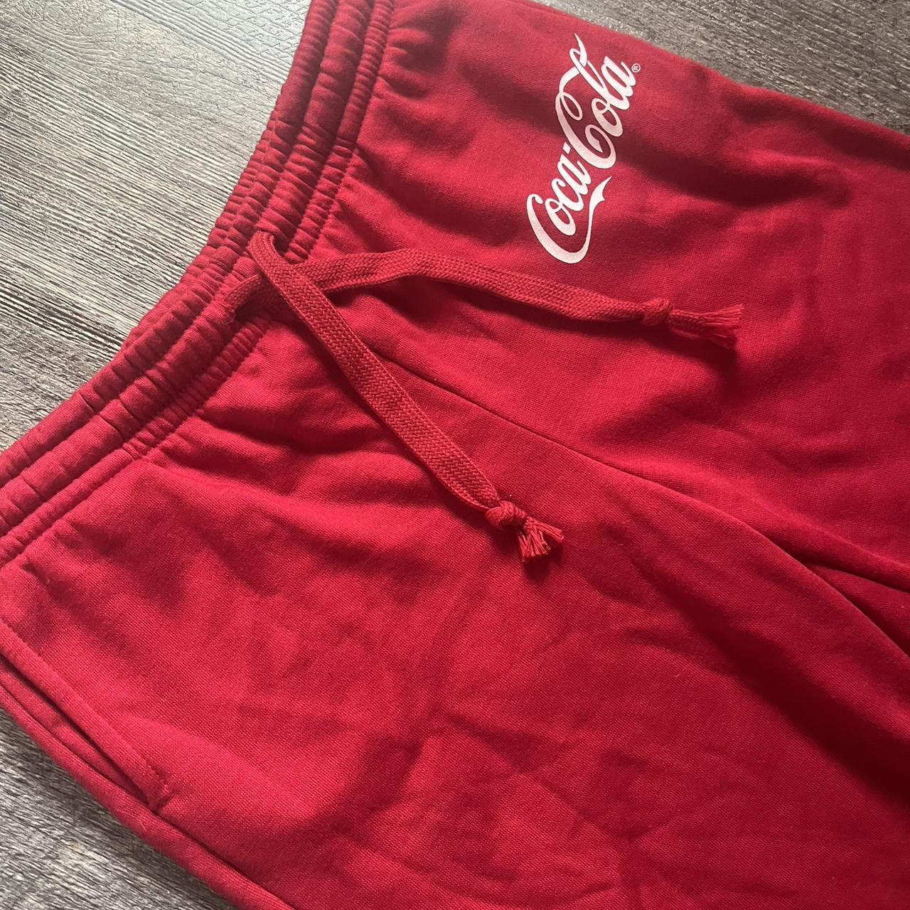 red coca-cola flared sweatpants - Depop