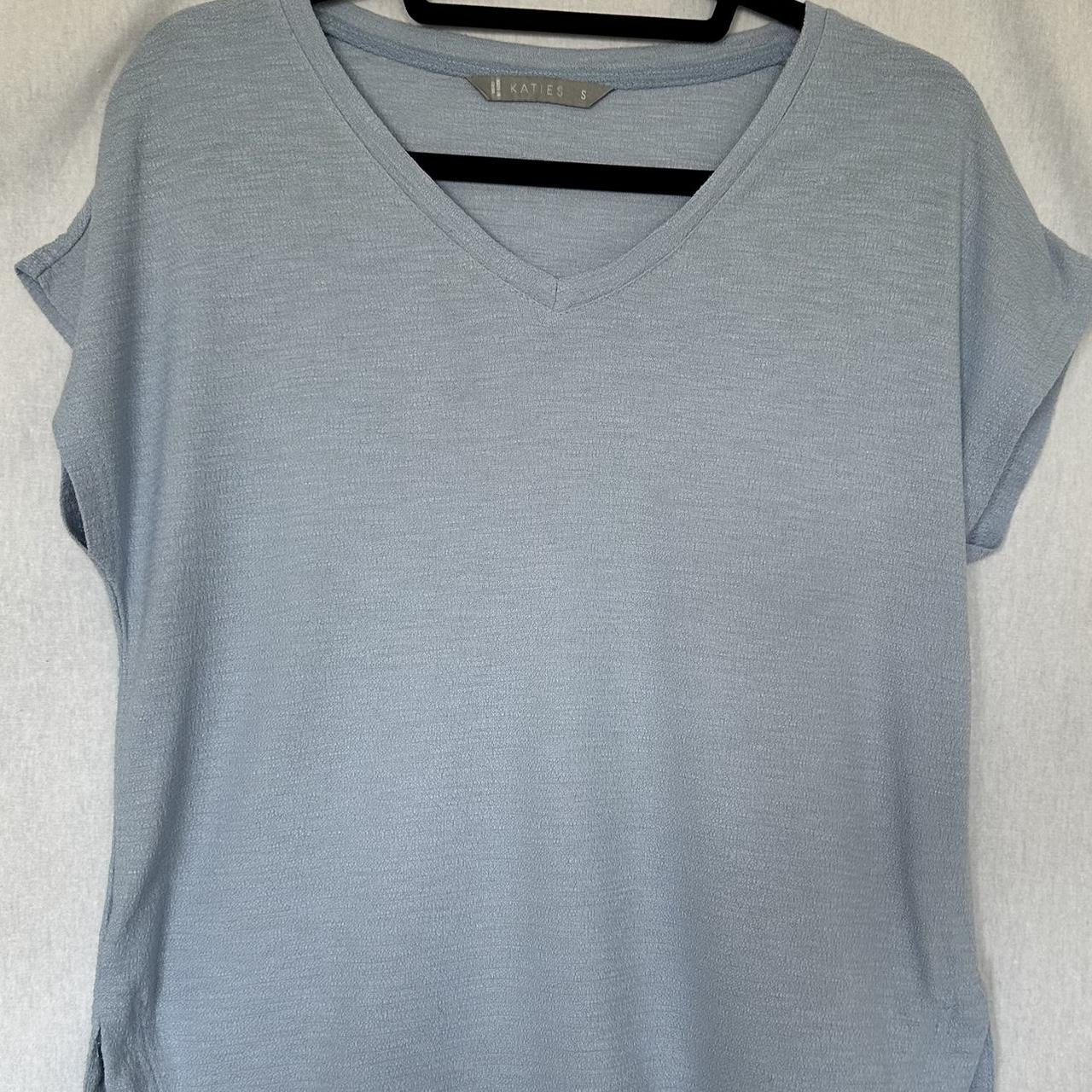 Powder blue short sleeve boxy, V-neck top. Never... - Depop