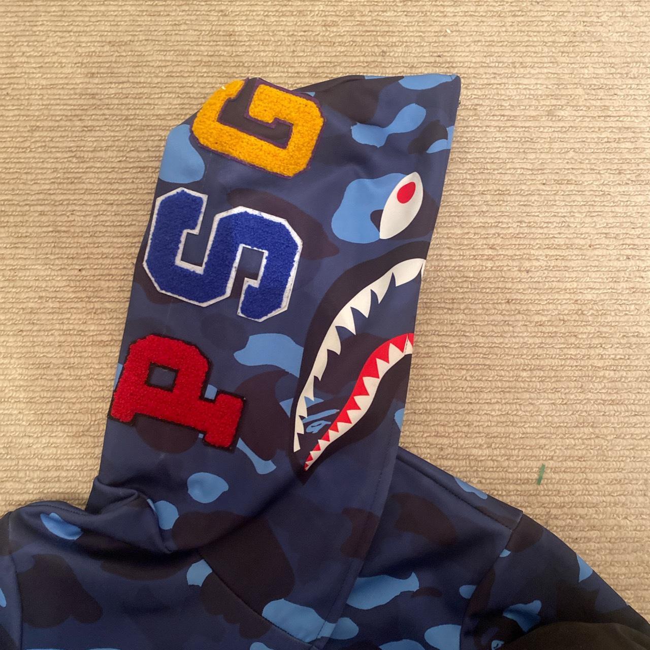 Dark blue bape hoodie Worn a few times but good... - Depop