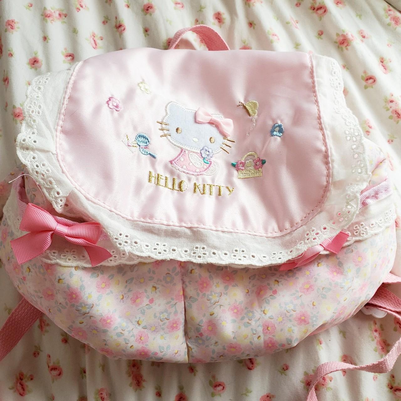 Baby pink, lacey and floral Hello Kitty backpack.... | Depop