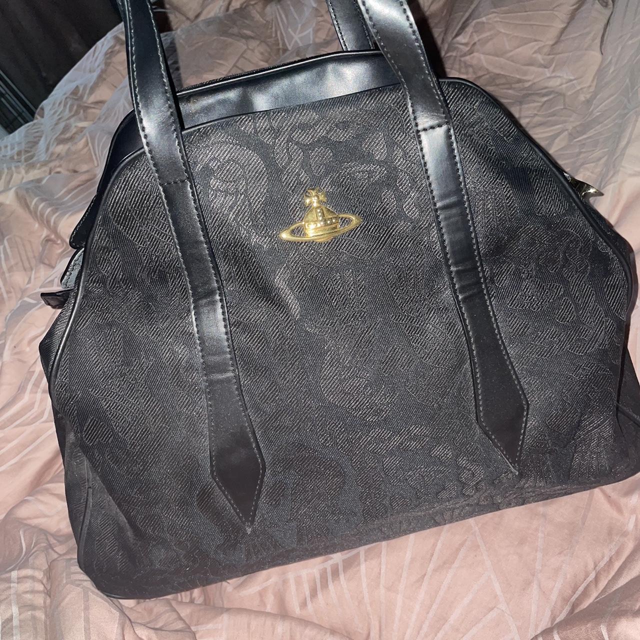 Vivienne Westwood overnight bag. Good zip and gold... - Depop