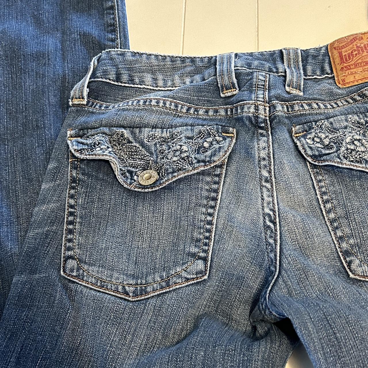 Size 2 low waisted slight flared jeans. The inside... - Depop