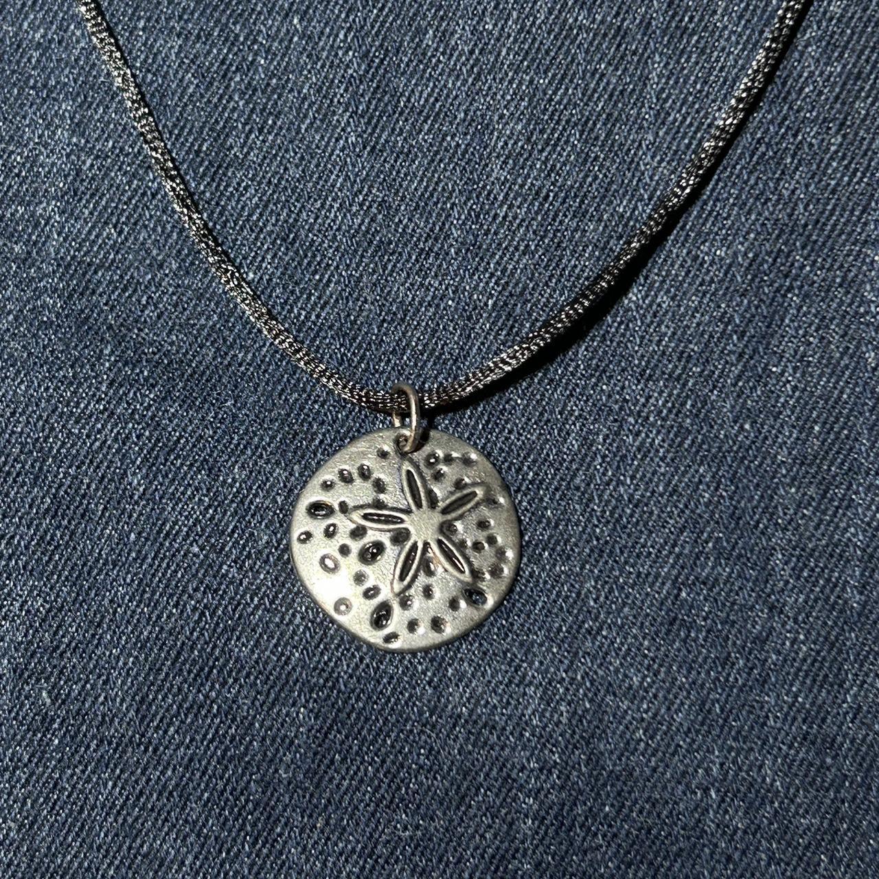 sand dollar pendant charm. Just comes with pendant... - Depop