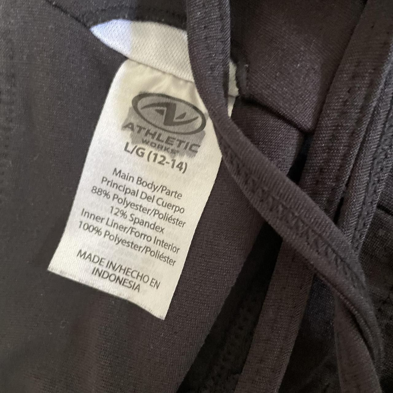 Athletic works Black sports bra with criss cross... - Depop