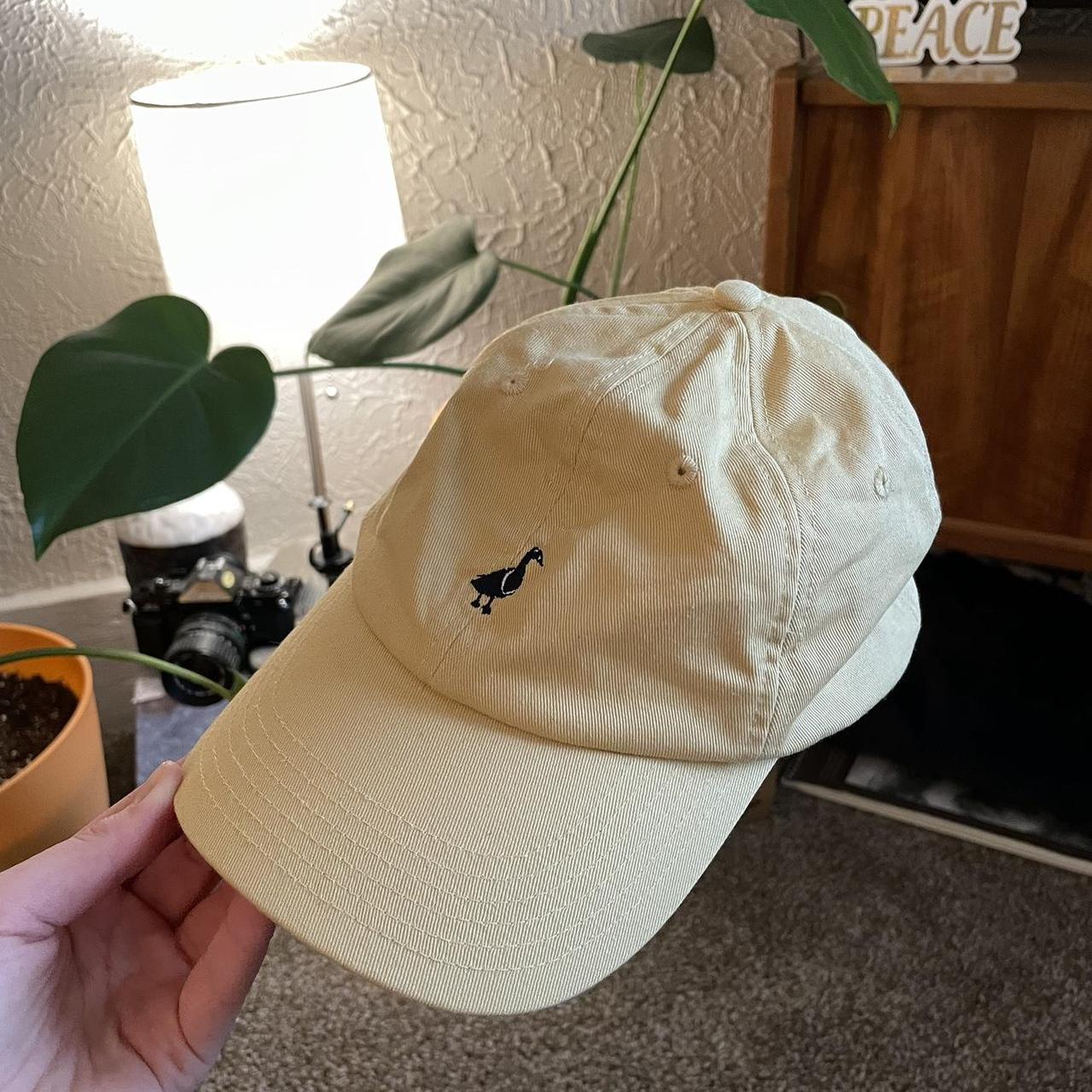 Super cute pastel yellow ball cap with an... - Depop