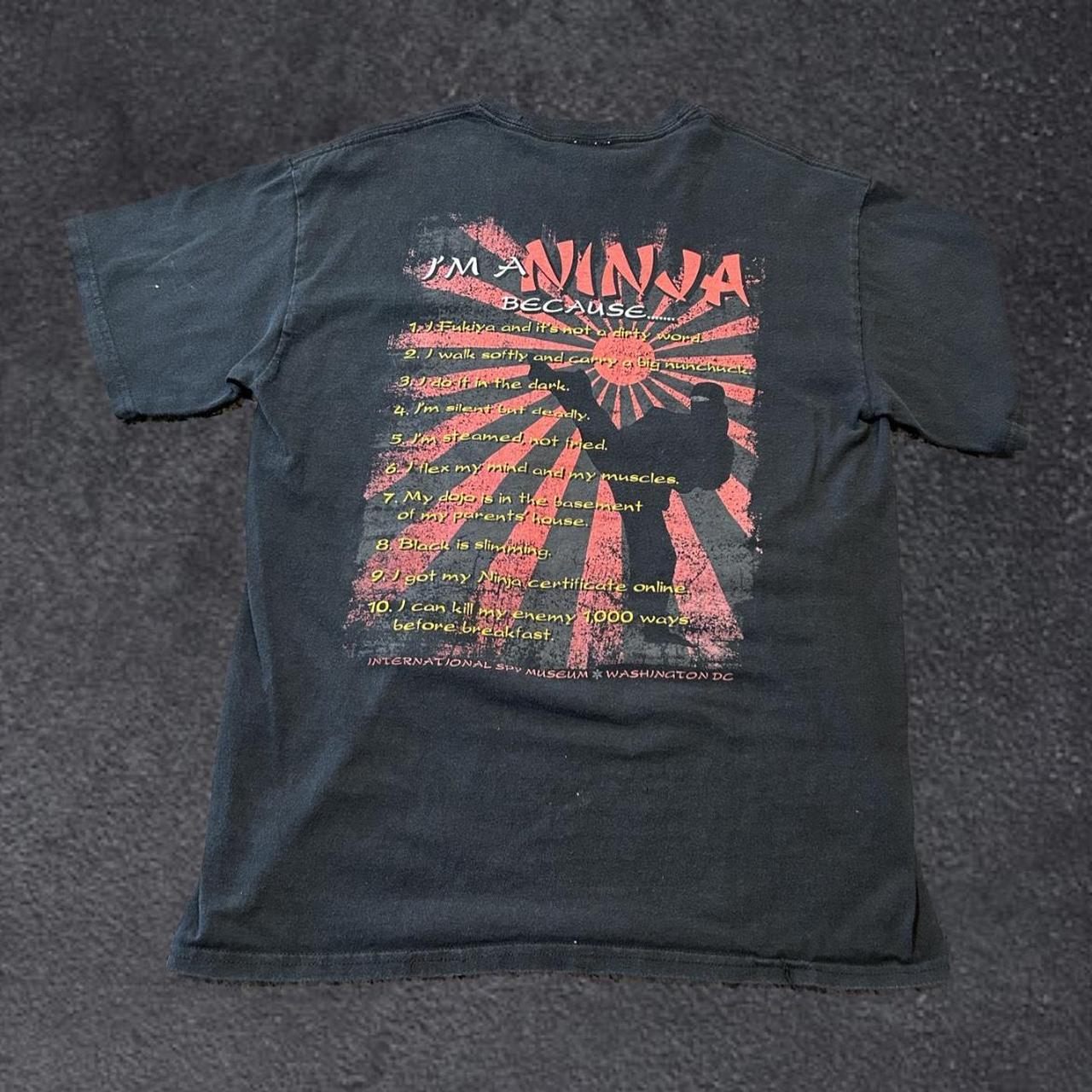 Medium black ninja shirt. Very interesting list on... - Depop
