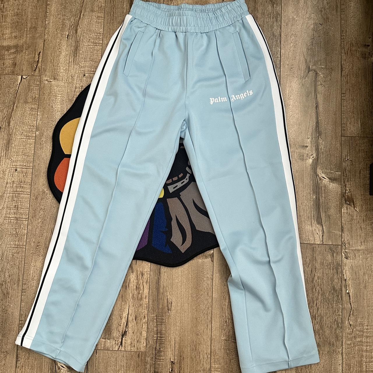 Light blue palm angels track pants - Depop
