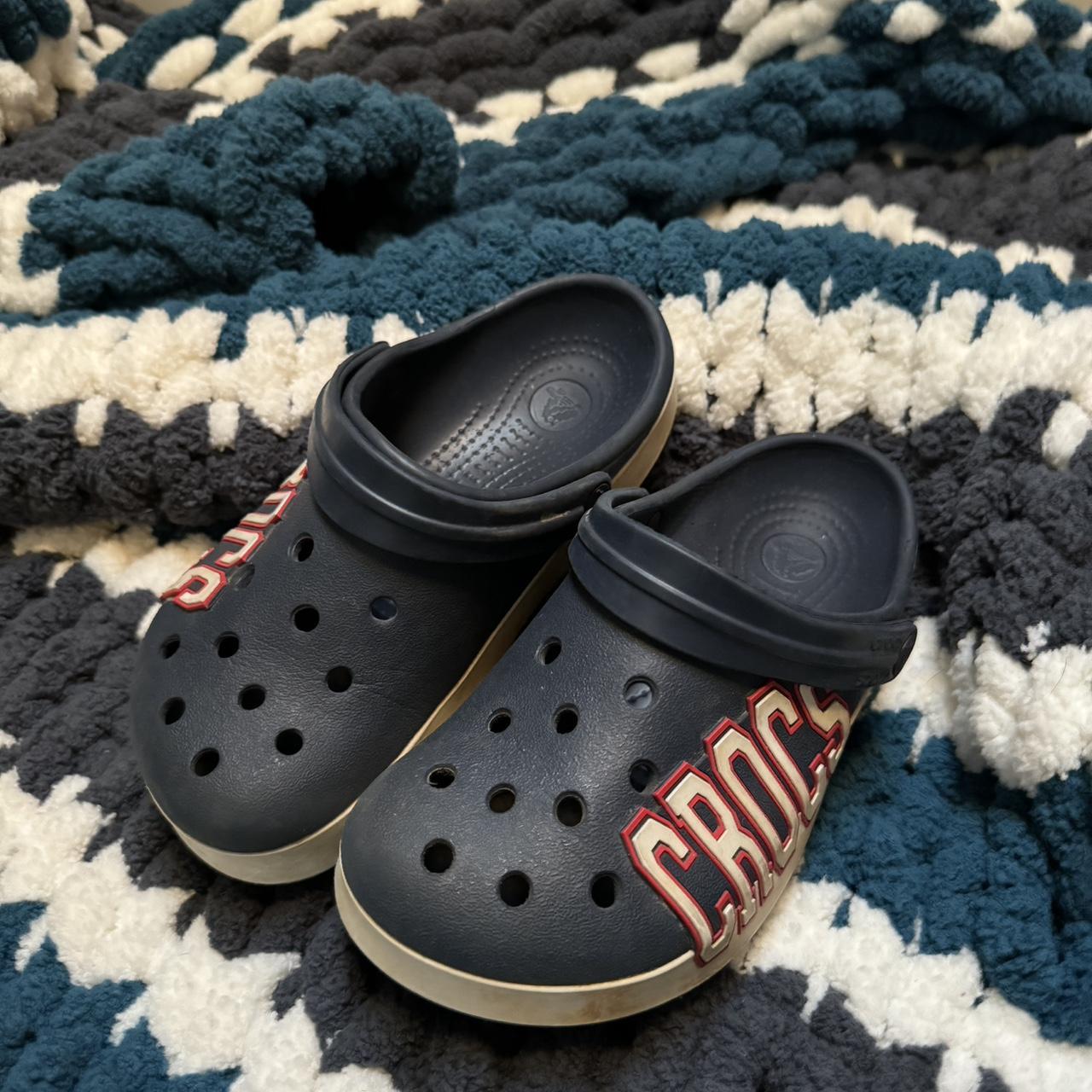 Crocs - Navy blue with red & white lettering, good... - Depop