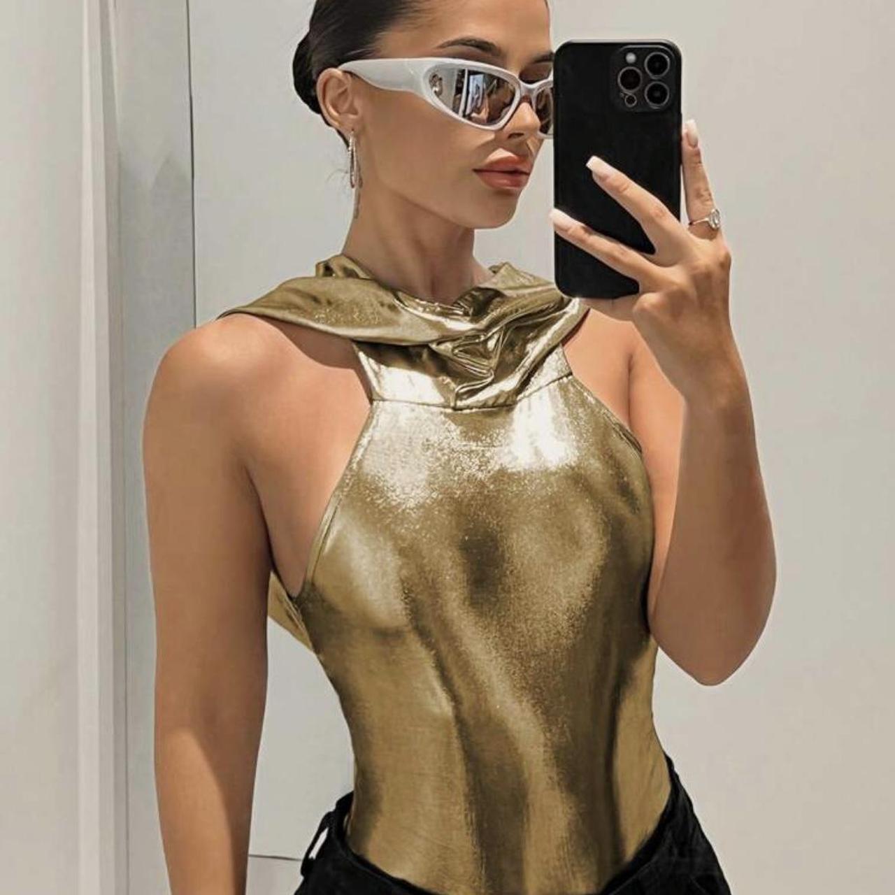 Metallic gold hooded bodysuit never worn, still has... - Depop