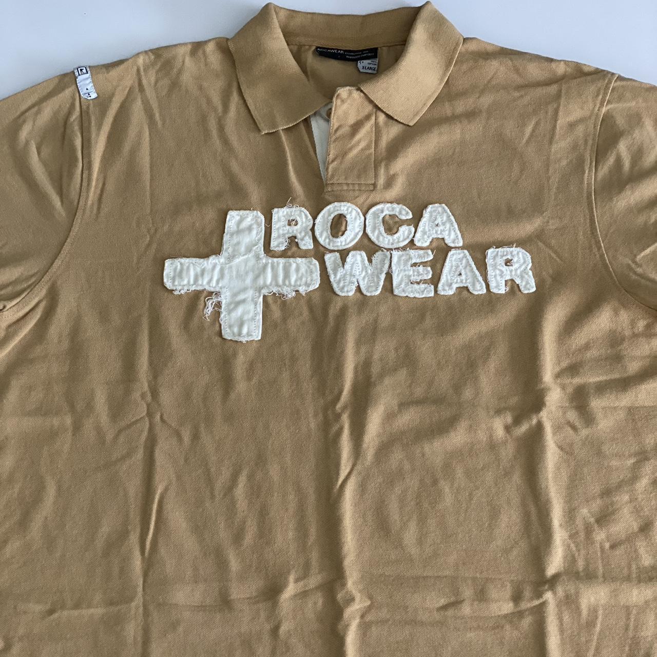 Roc-a-wear khaki XL polo shirt. Large Rocawear print... - Depop