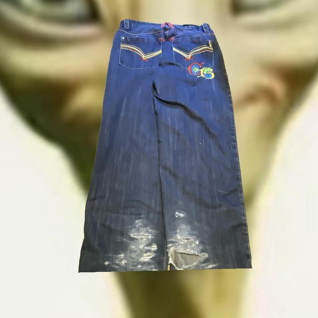 Blue and red pants with a distressed look with... - Depop