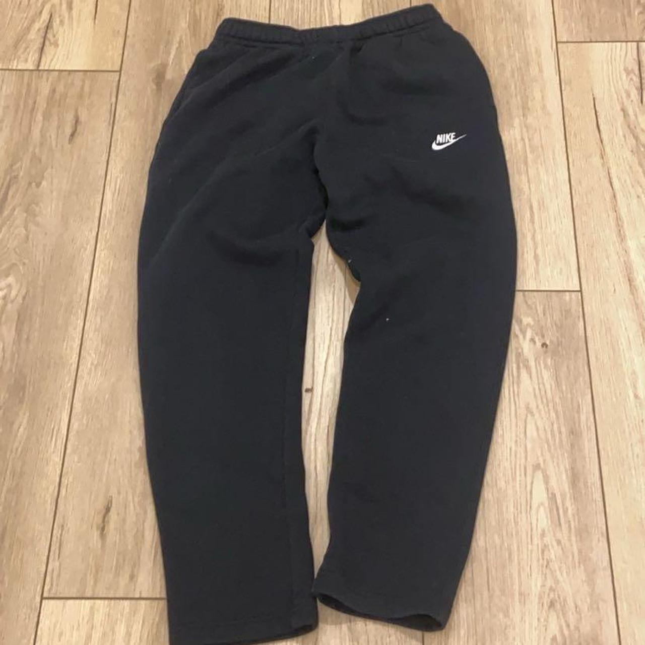 Black open leg baggy black Nike sweatpants - Depop