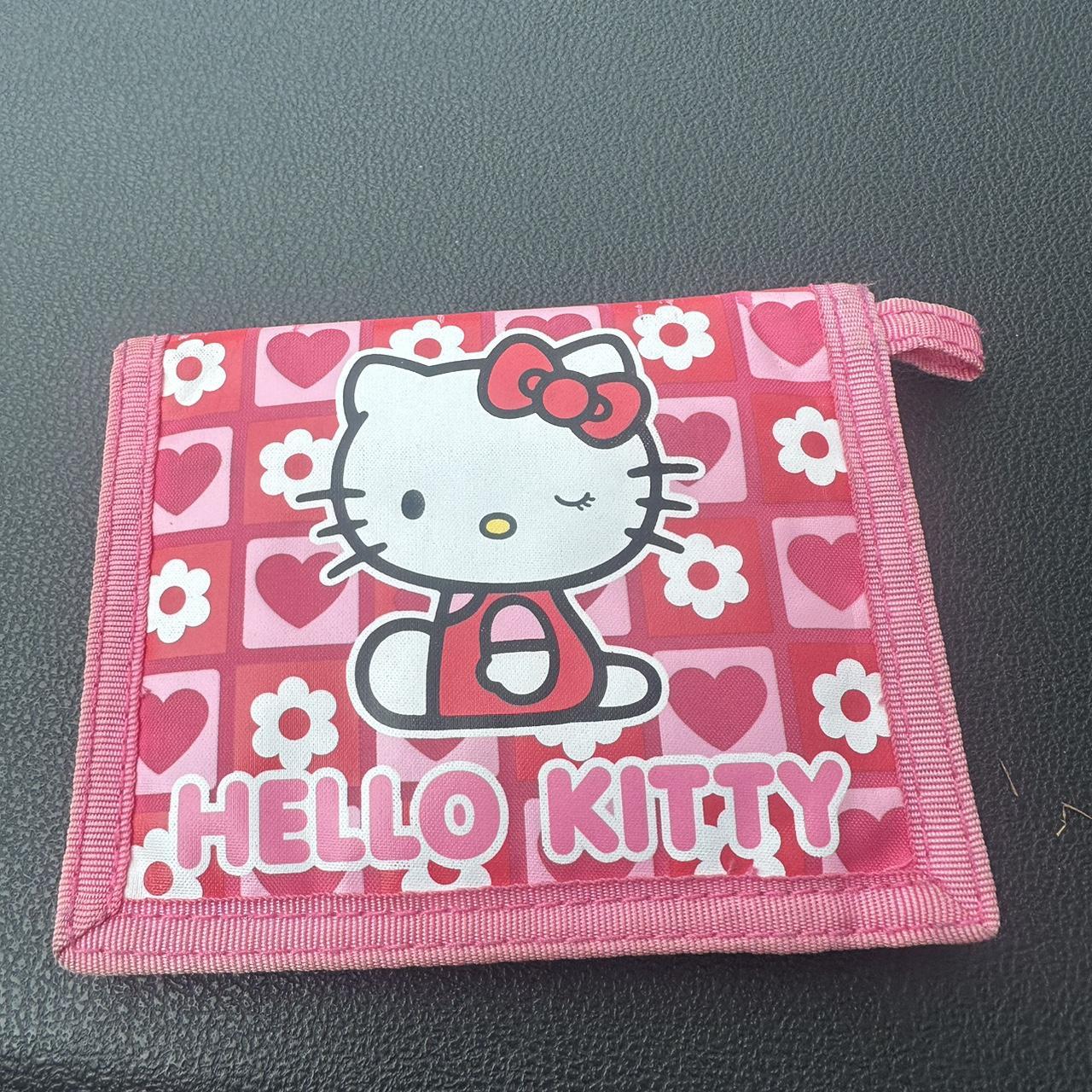 Pink hello kitty wallet minor orange stain dm before... - Depop