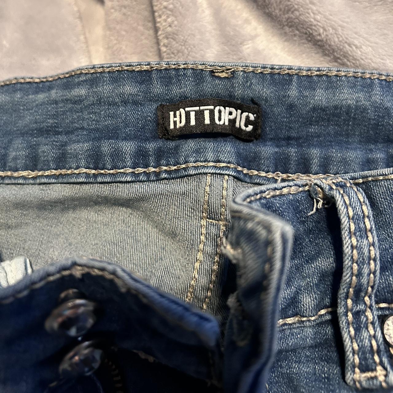 Hot Topic mid rise flared jeans with skull and cross... - Depop