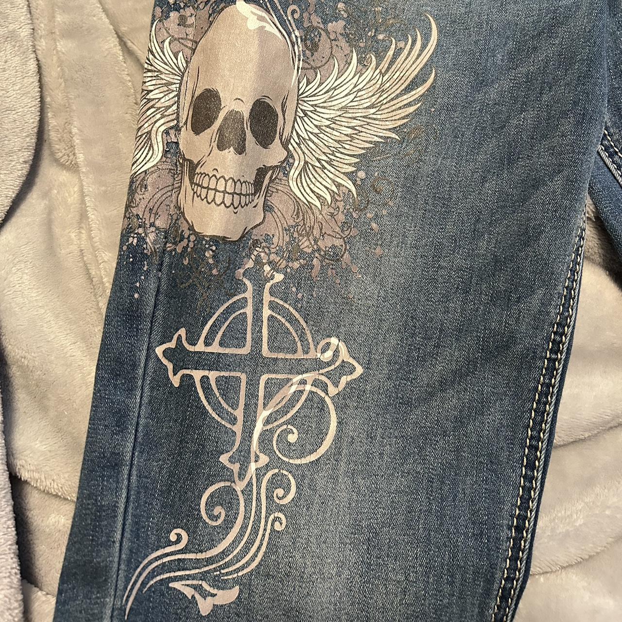 Hot Topic mid rise flared jeans with skull and cross... - Depop