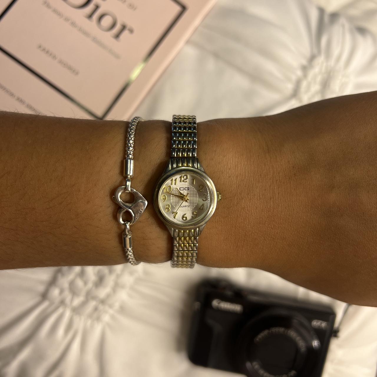 Two Tone CG Quartz Stretch Band Watch Length:... - Depop