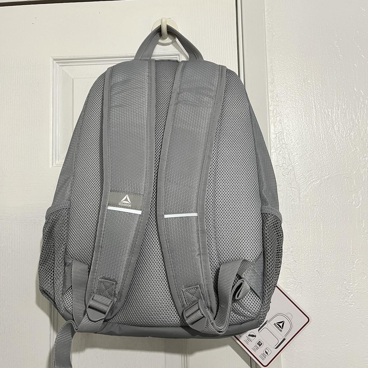 Gray Reebok backpack, 5 pockets. A spot to put your... | Depop