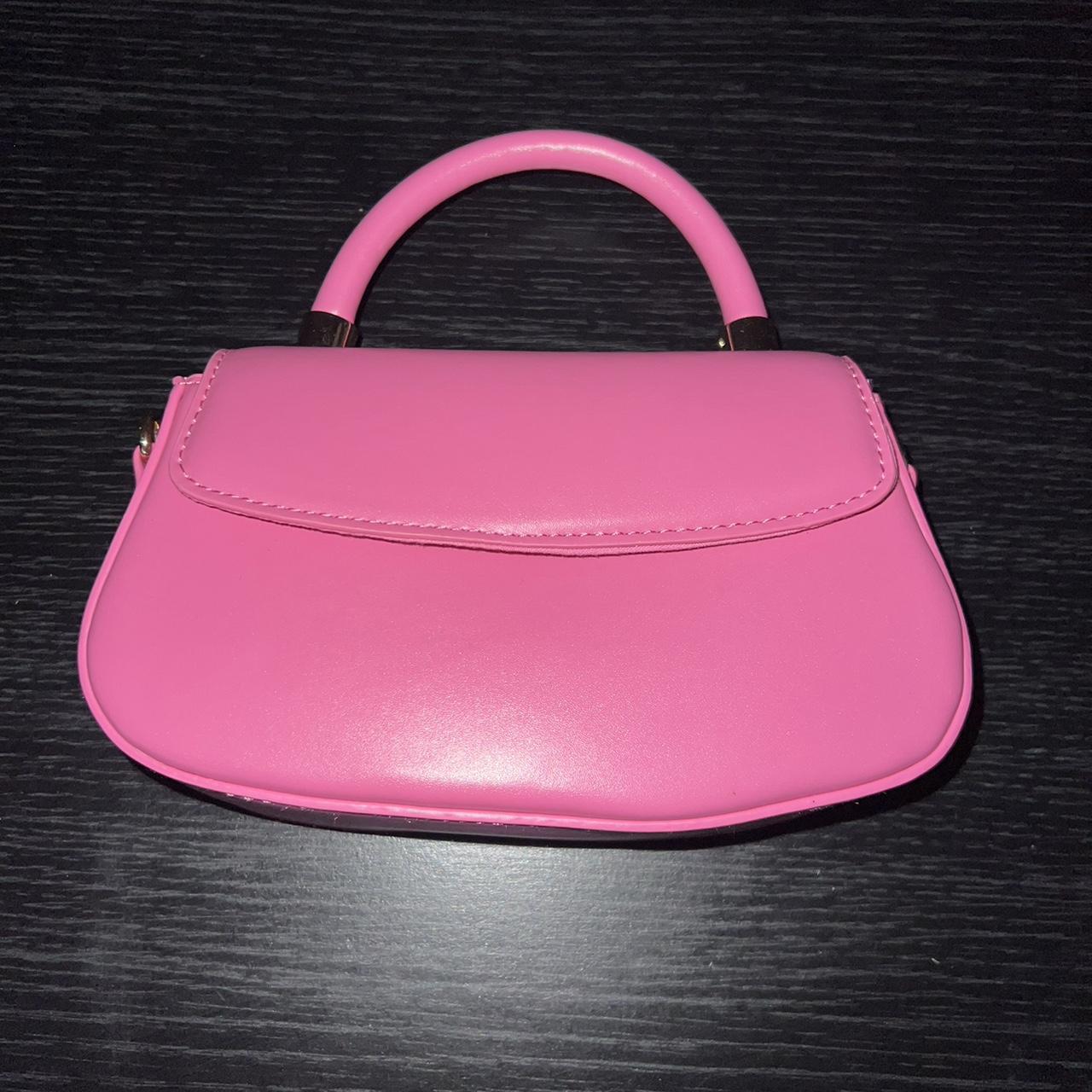 - Pink mini cross body bag - Never worn , brand new... - Depop