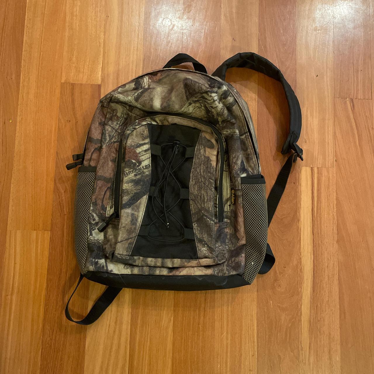 Camo backpack with adjustable straps and multiple... - Depop