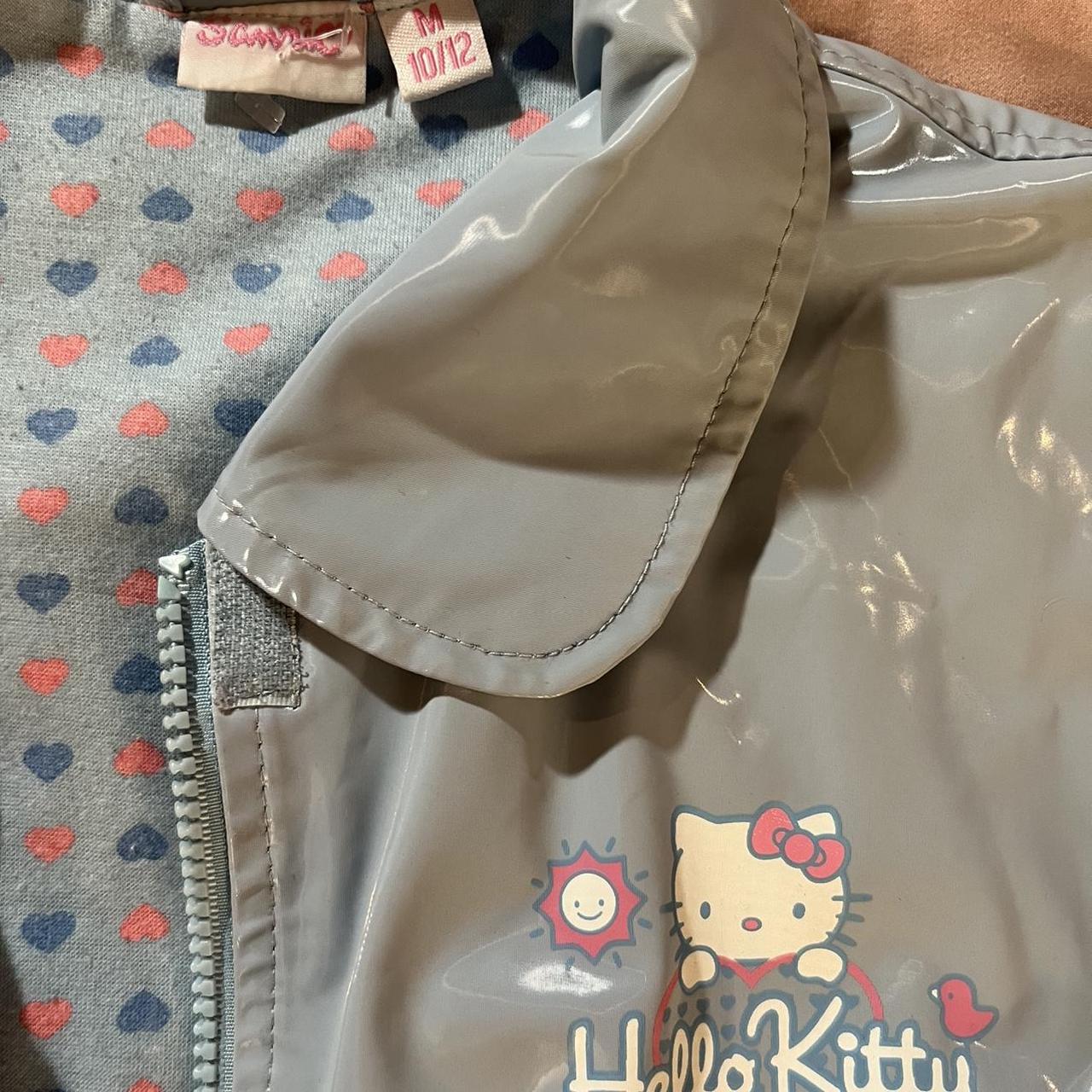 Super cute light blue sanrio hello kitty raincoat... - Depop