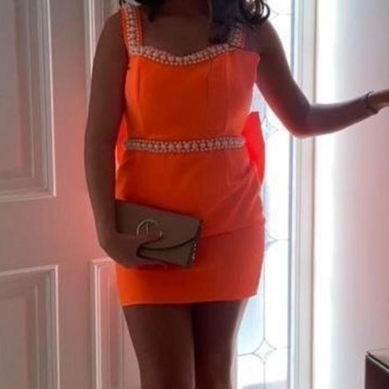 Orange backless dress with pearl detail and headband... - Depop