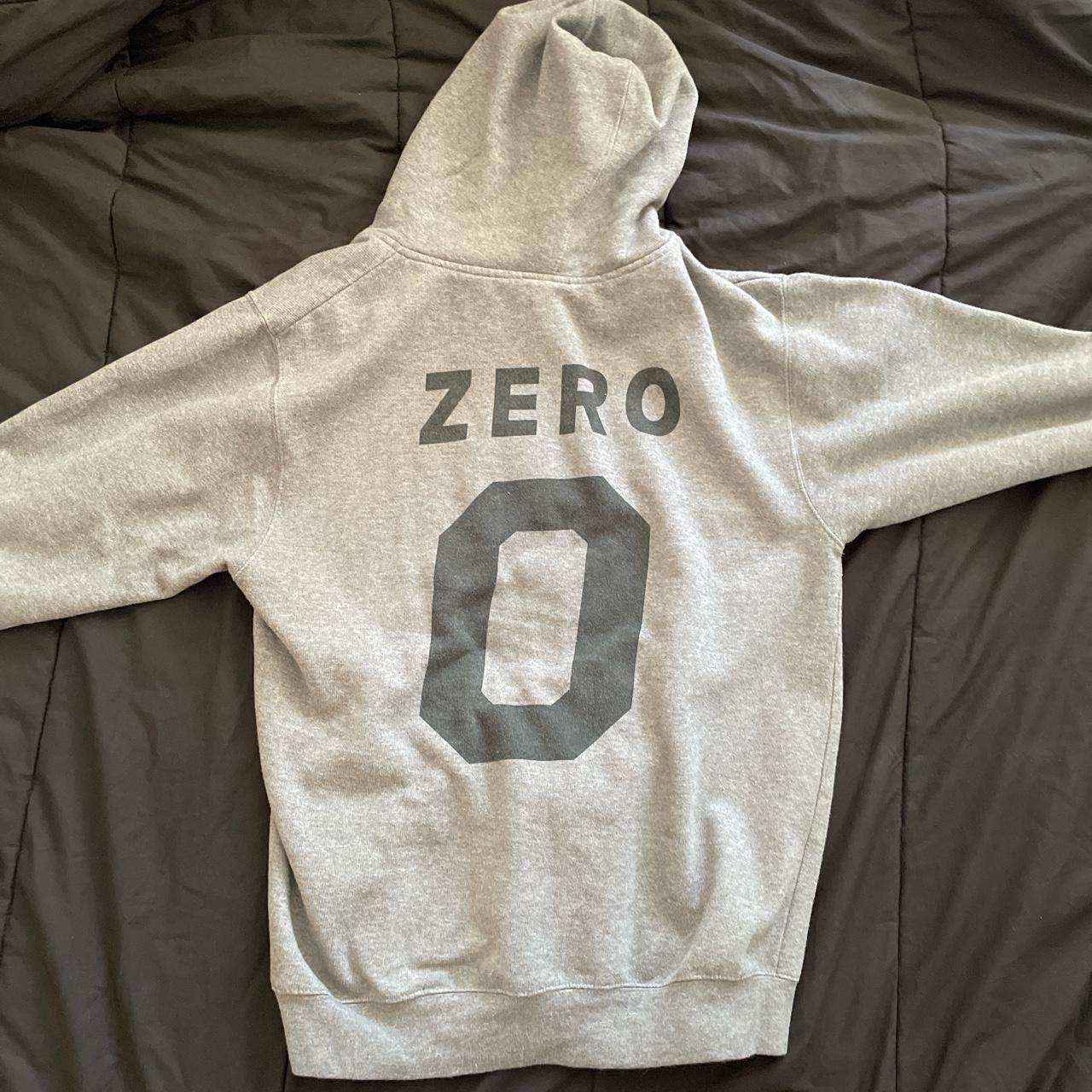 Grey zero zip up hole on left sleeve - Depop