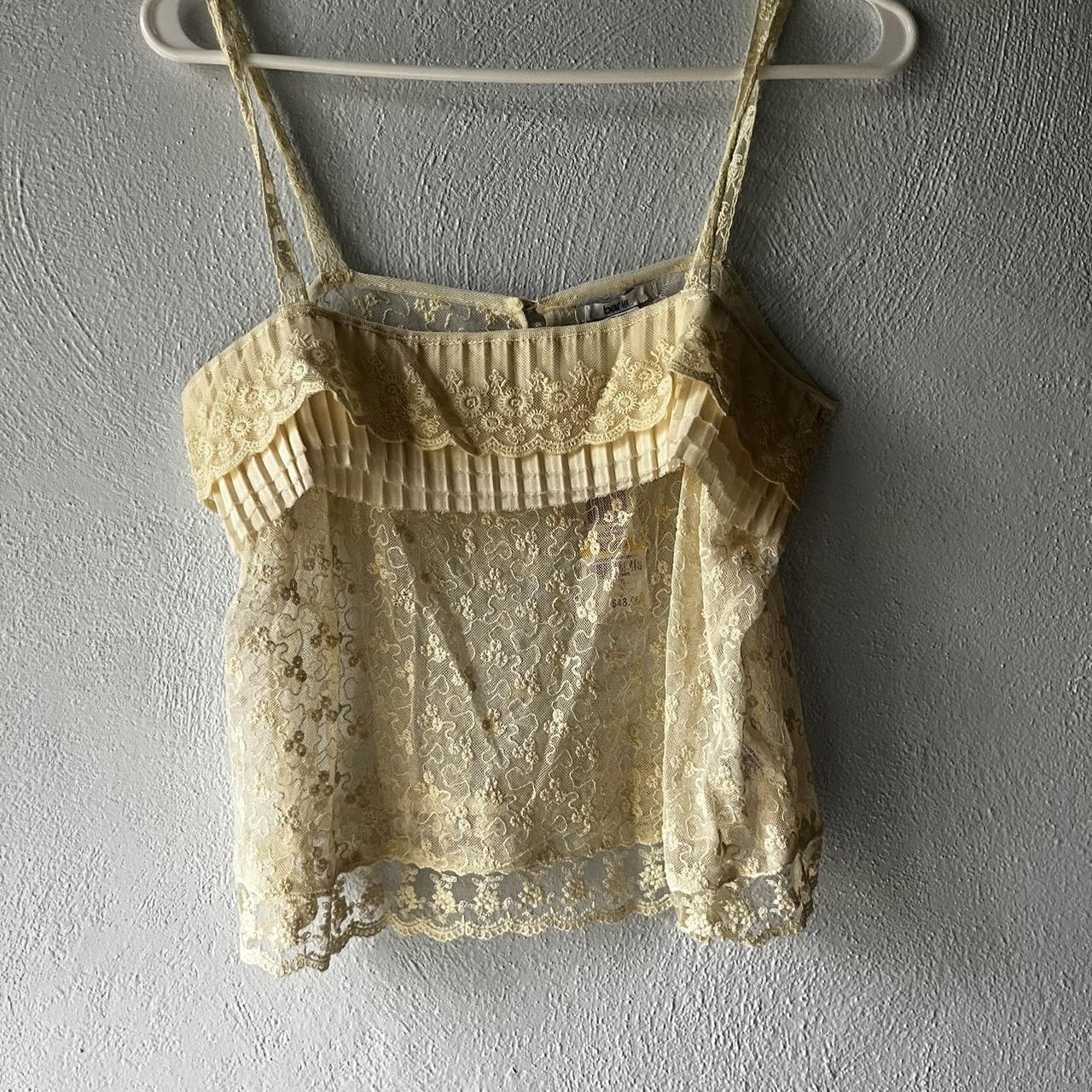 creme lace bar III tank top from early 2010s with... - Depop