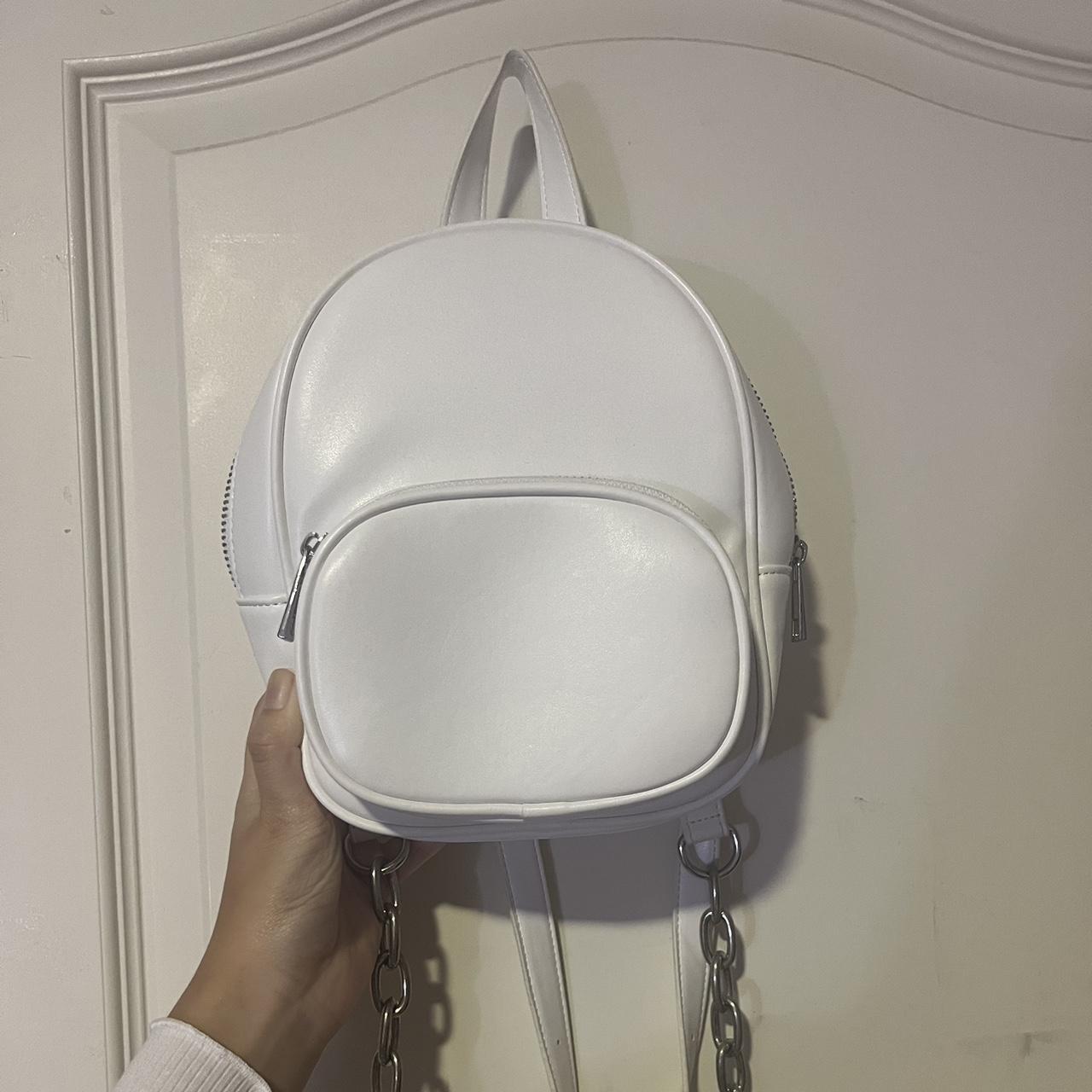 Plain white mini backpack! Has metal chains in the... - Depop