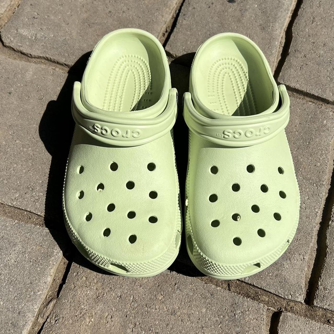 lime green colored crocs size 8 women / 6... - Depop
