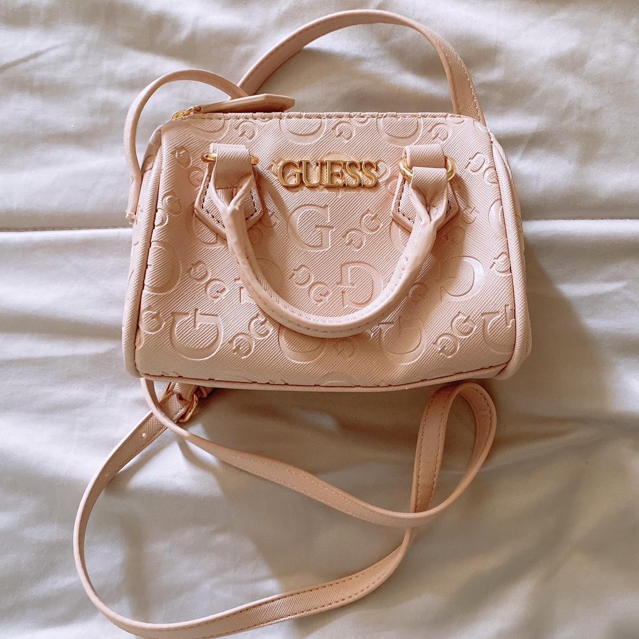 Guess mini purse in light pink. Photo is accurate... - Depop