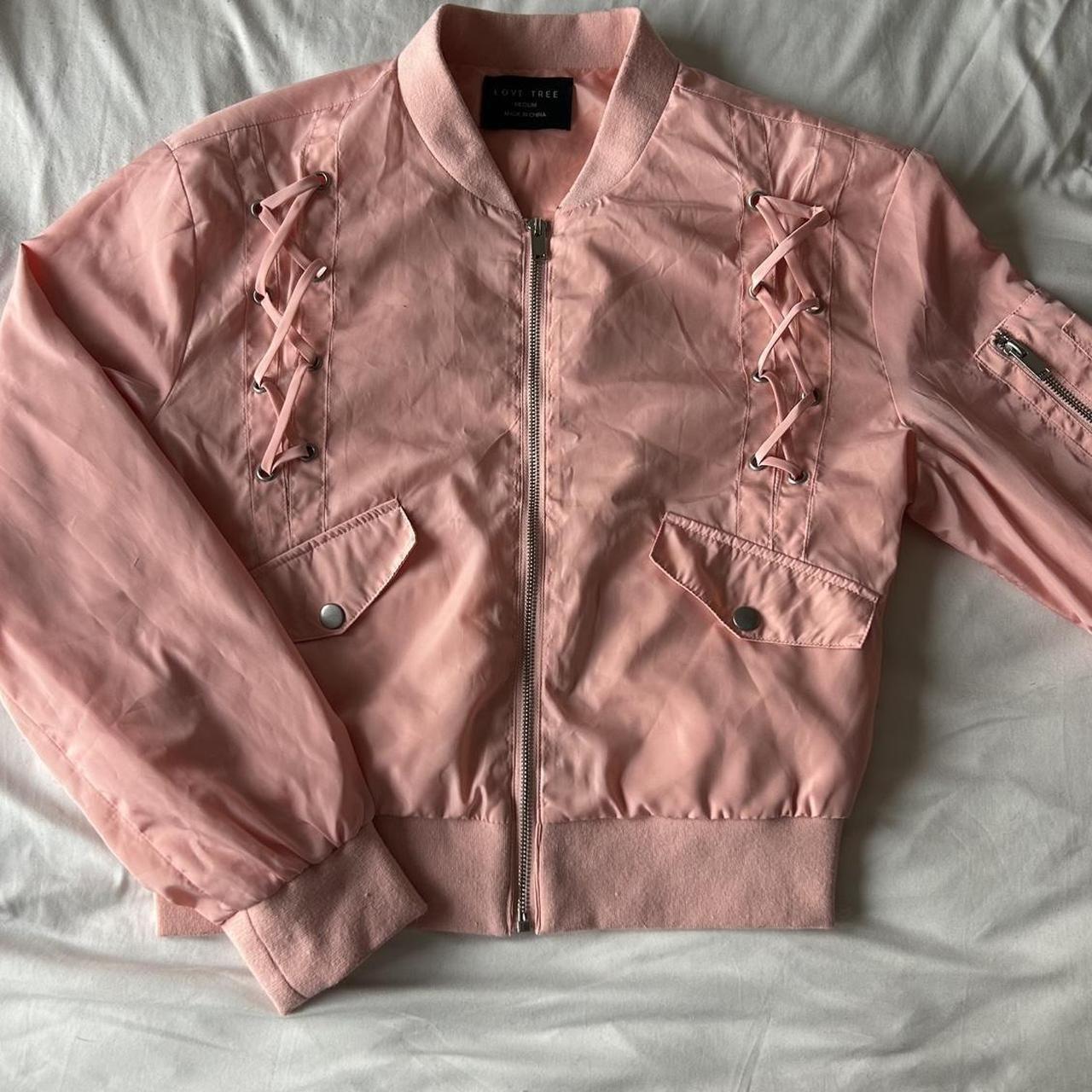 Pink bomber jacket with criss cross lace details on... | Depop