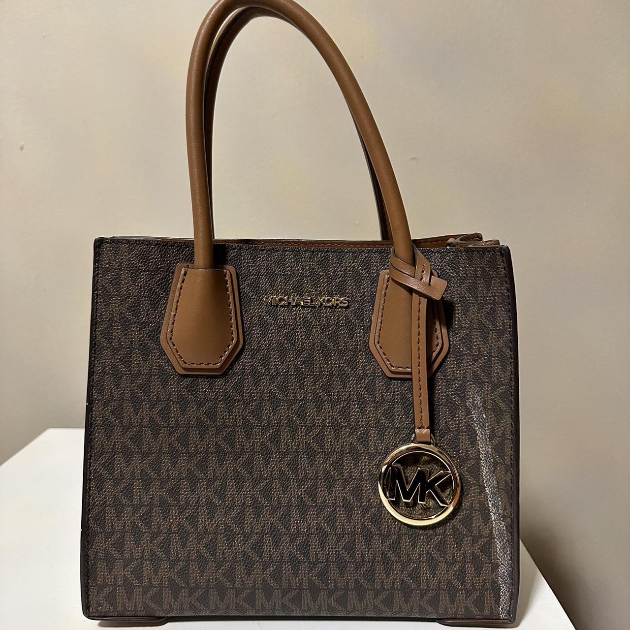 Small brown Michael Kors hand bag with strap included - Depop
