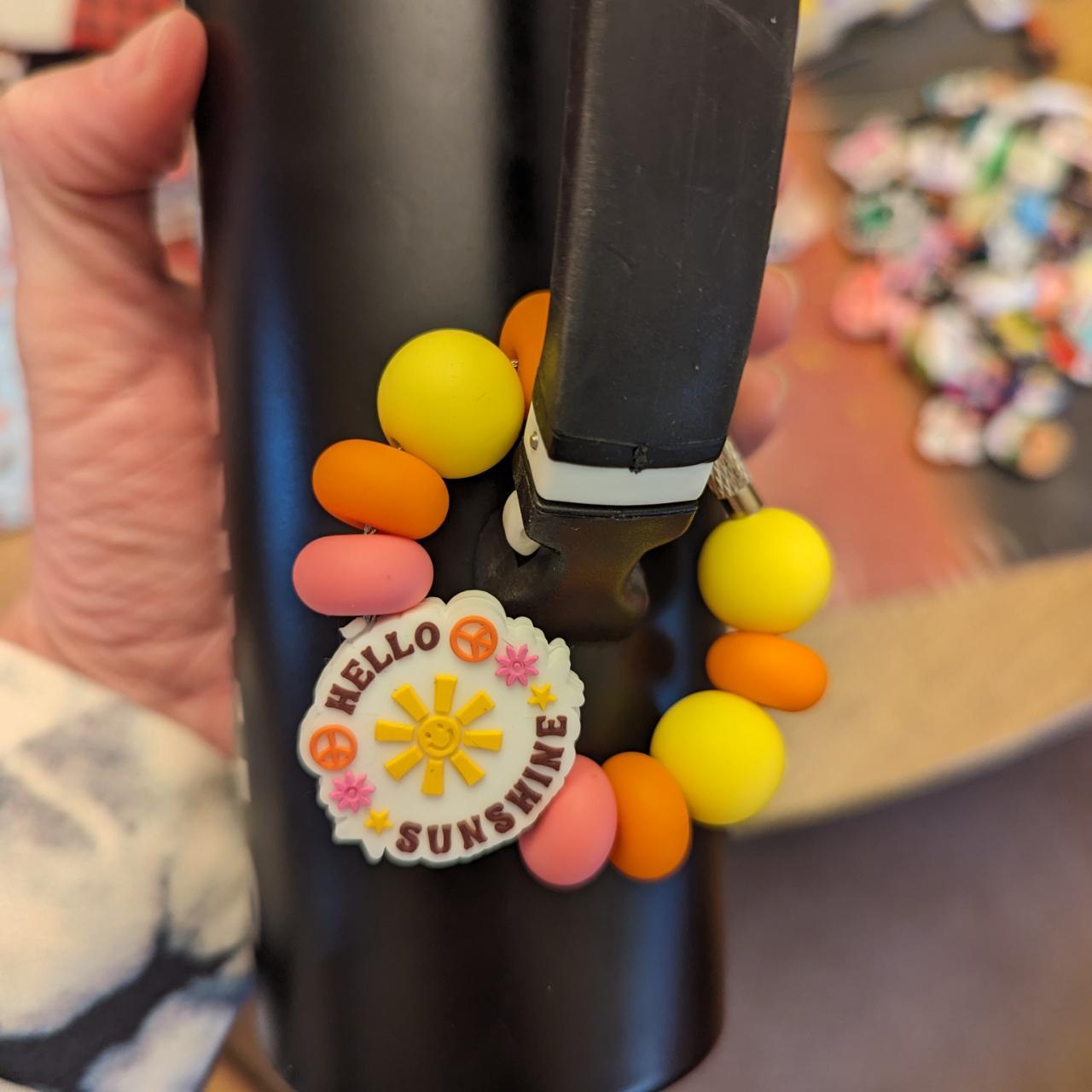 Hello Sunshine cup charm, yellow, orange and pink in... - Depop