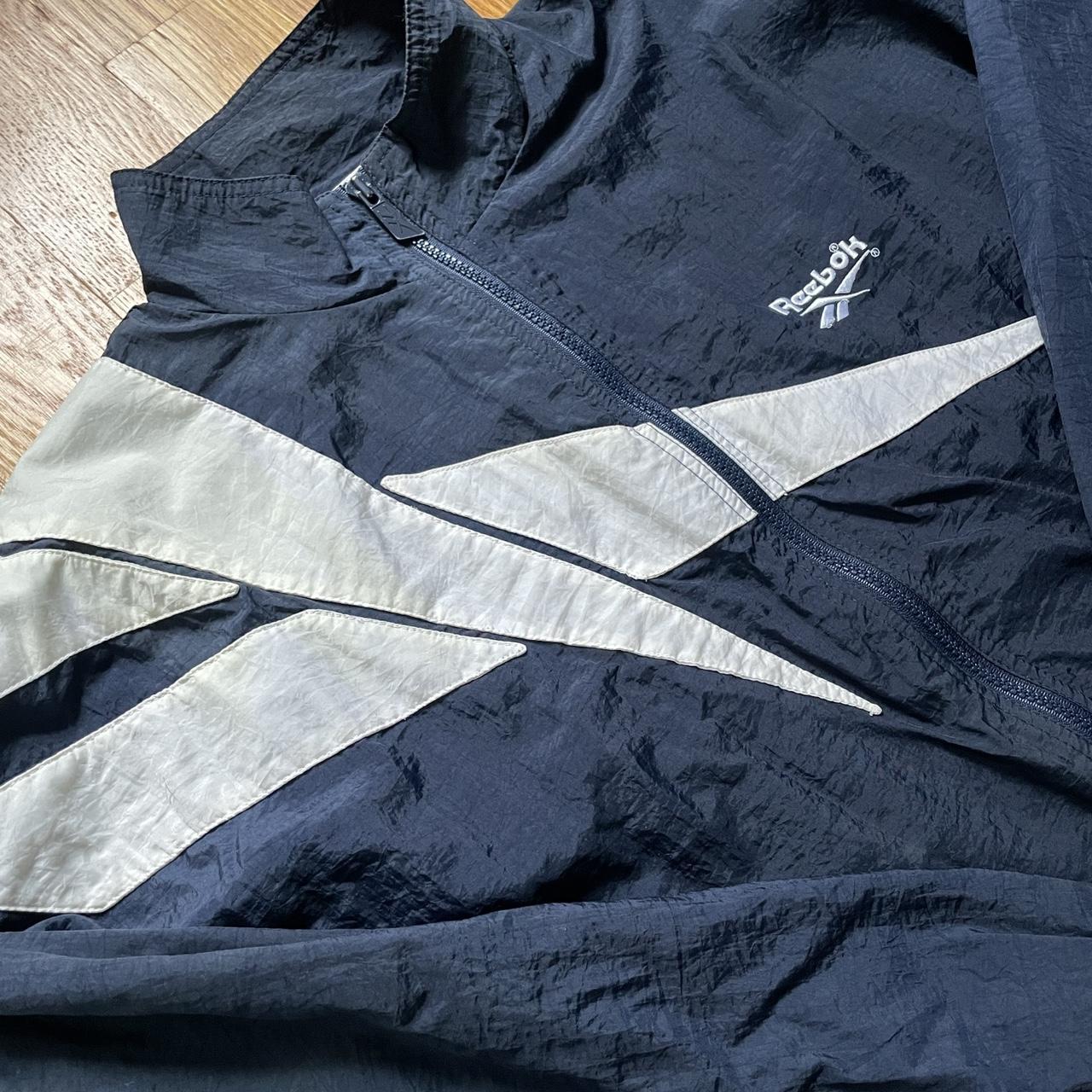 Reebok windbreaker Navy Slight yellowing on the... - Depop