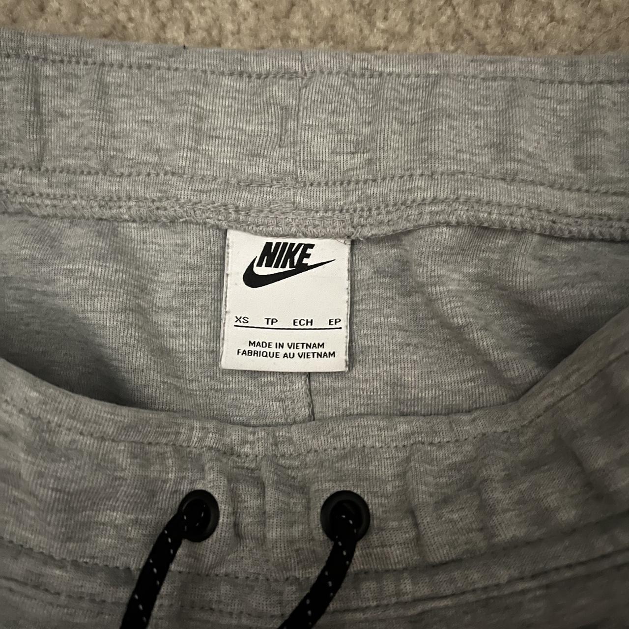 Grey Nike tech pants Men XS Worn a few times - Depop