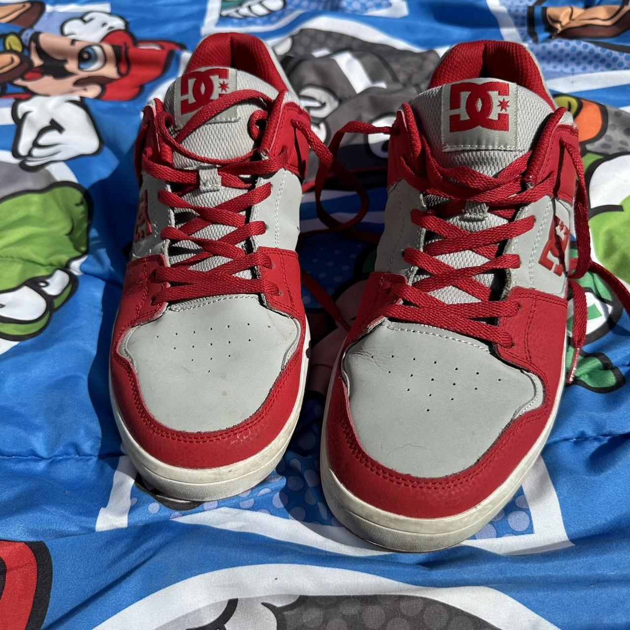 Red n grey DCshoes - obviously been worn n shows... - Depop