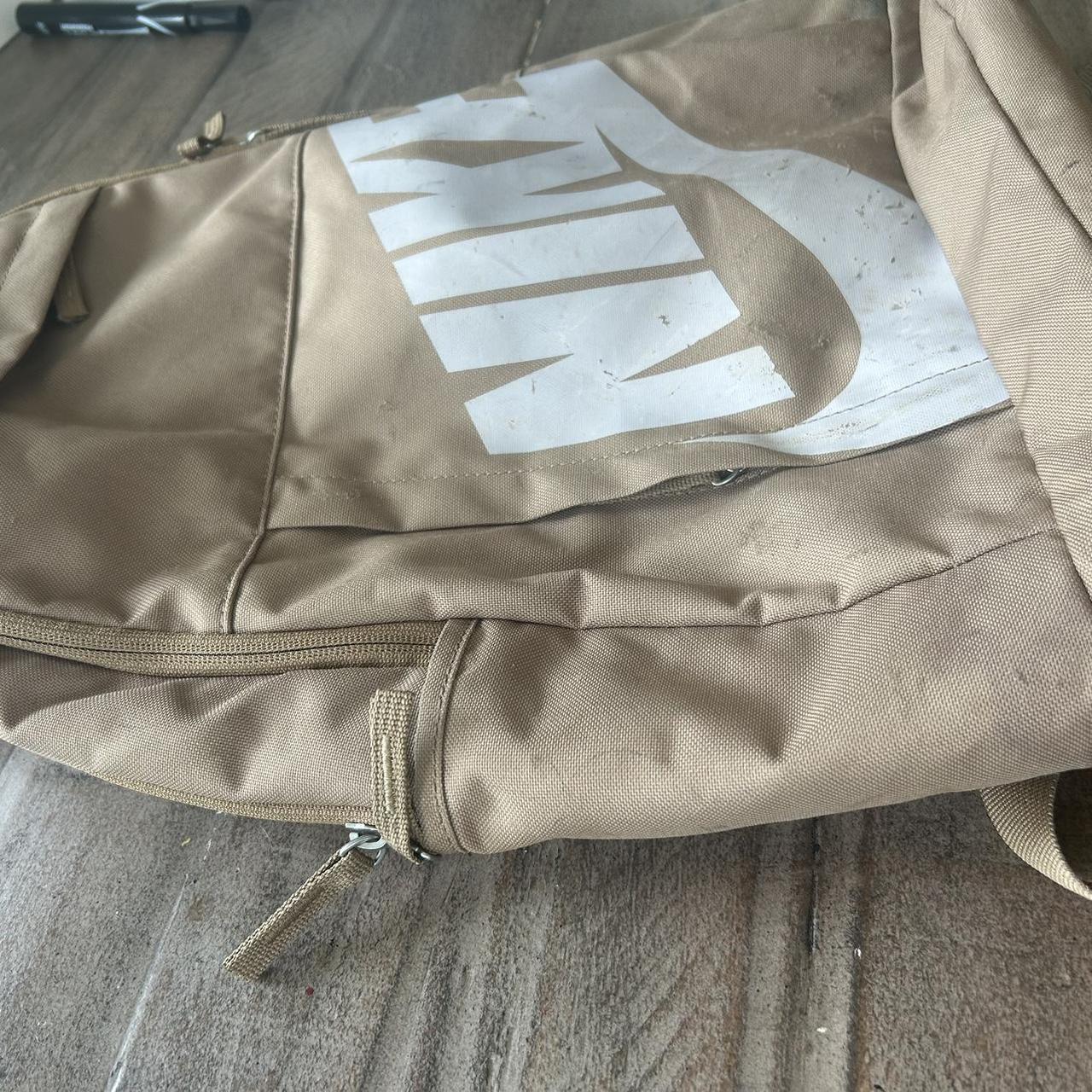 Tan Nike Elemental Backpack, fair condition #nike... - Depop