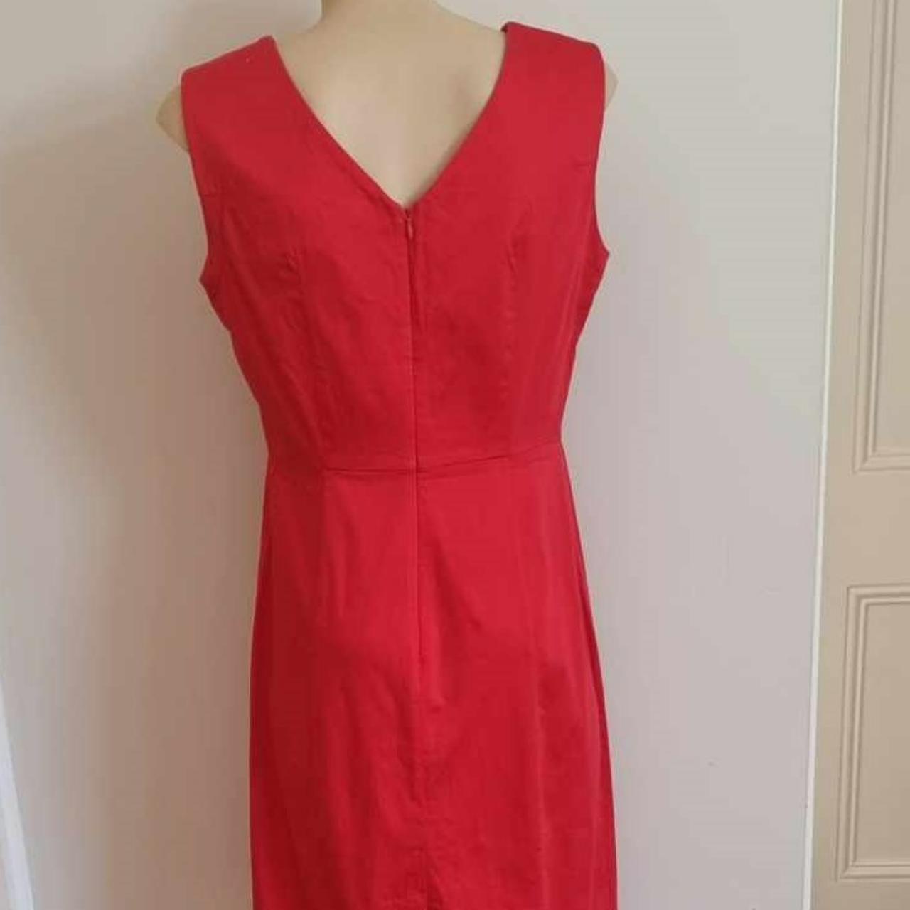 Basque red dress fits just below the knee. V cut at... - Depop