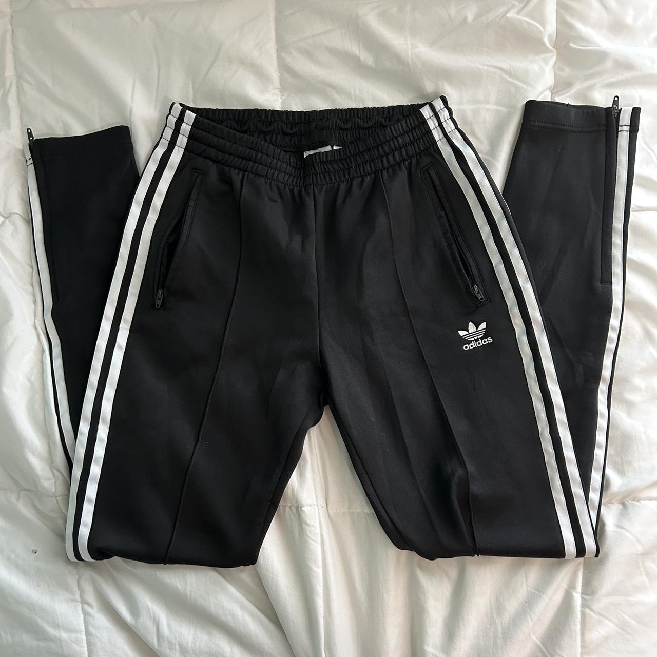 adidas black and white track pants -has zippers on... - Depop
