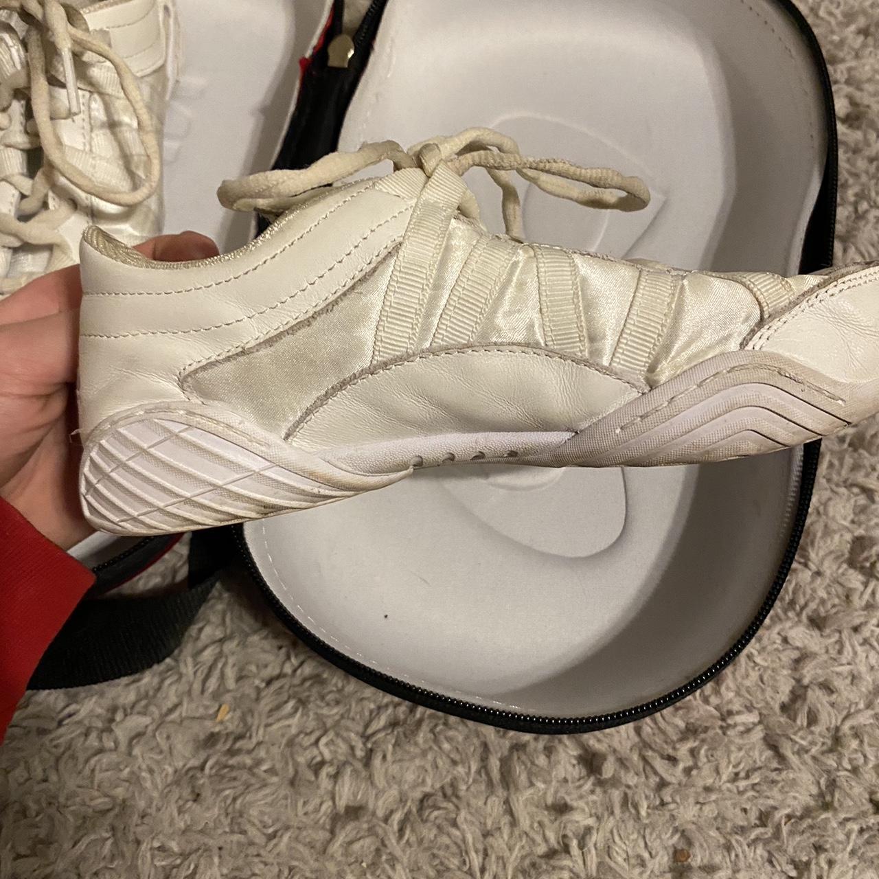 Infinity cheer shoes with infinity shoe carrier! - Depop