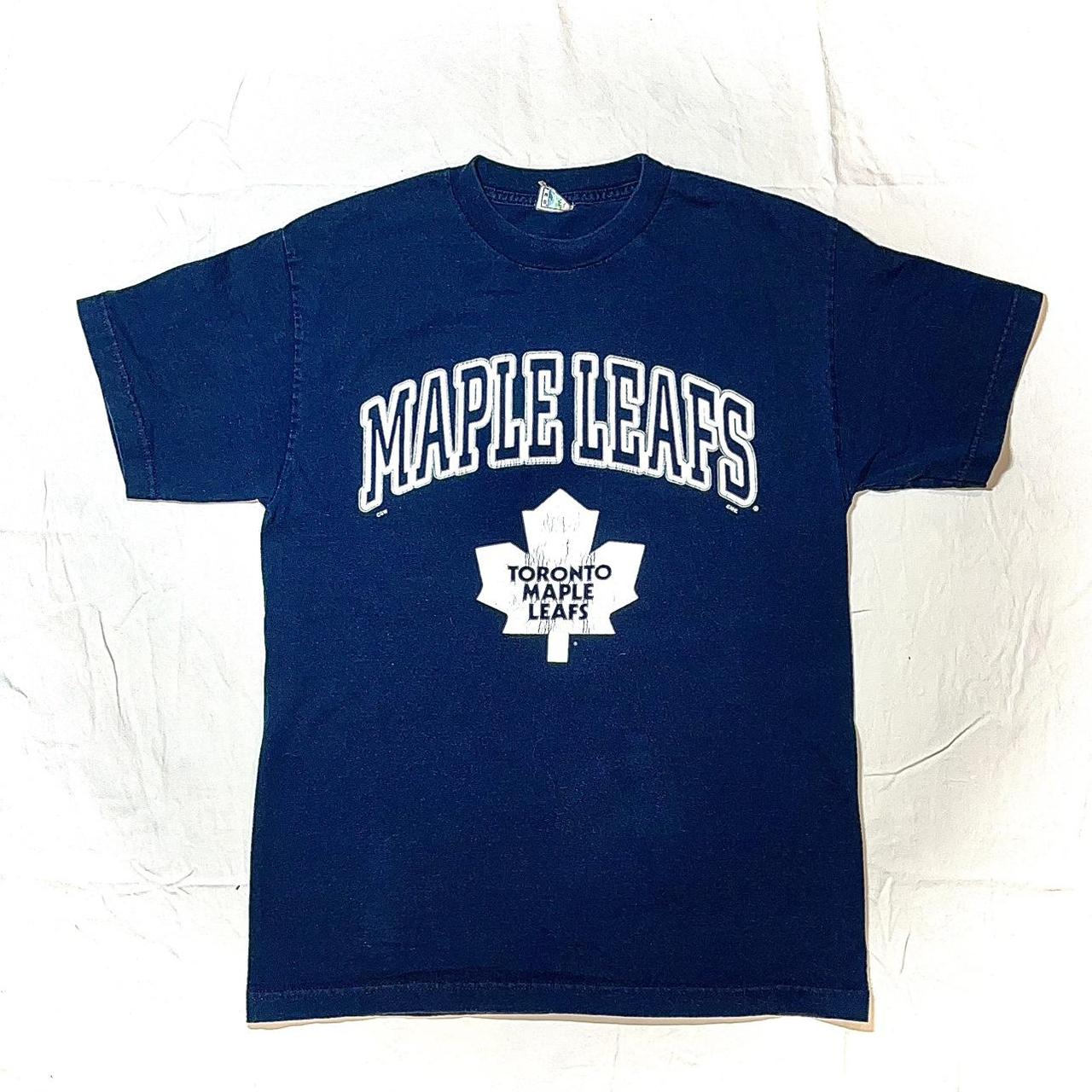 Medium navy blue Maple Leafs tee shirt, brand is Waves. - Depop