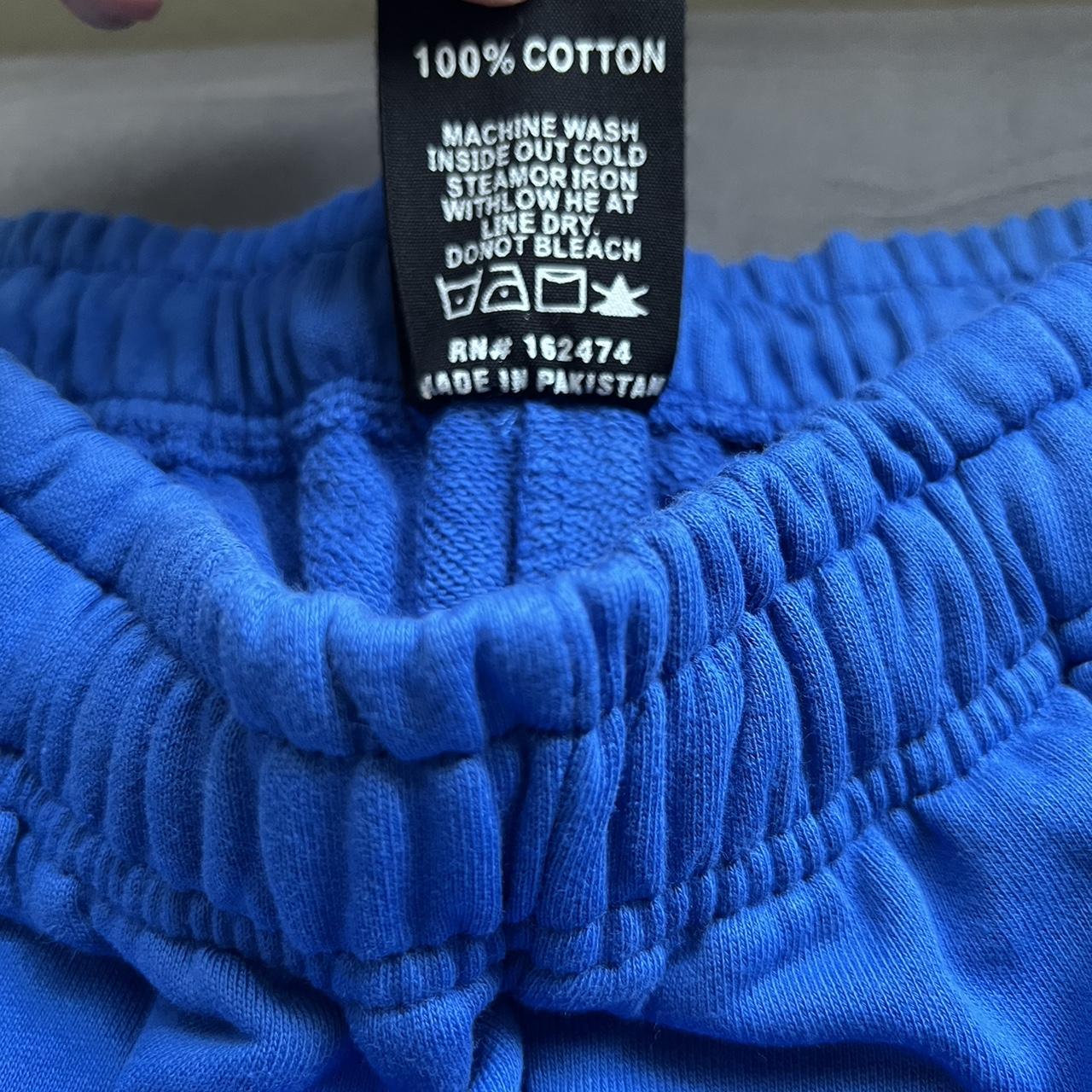 Blue spider sweatpants size large brand new worn once - Depop