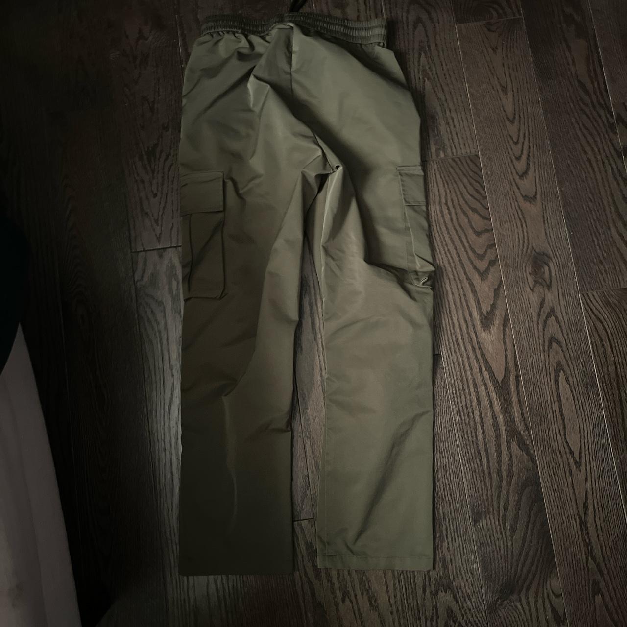 Green zipper cargo pants Hole in pocket easily... - Depop