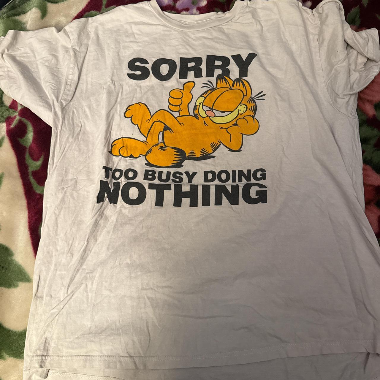 Garfield "sorry too busy doing nothing" cream tee... | Depop
