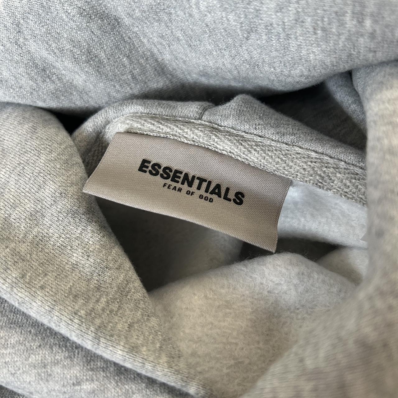 Essentials hoodie dark gray - Depop