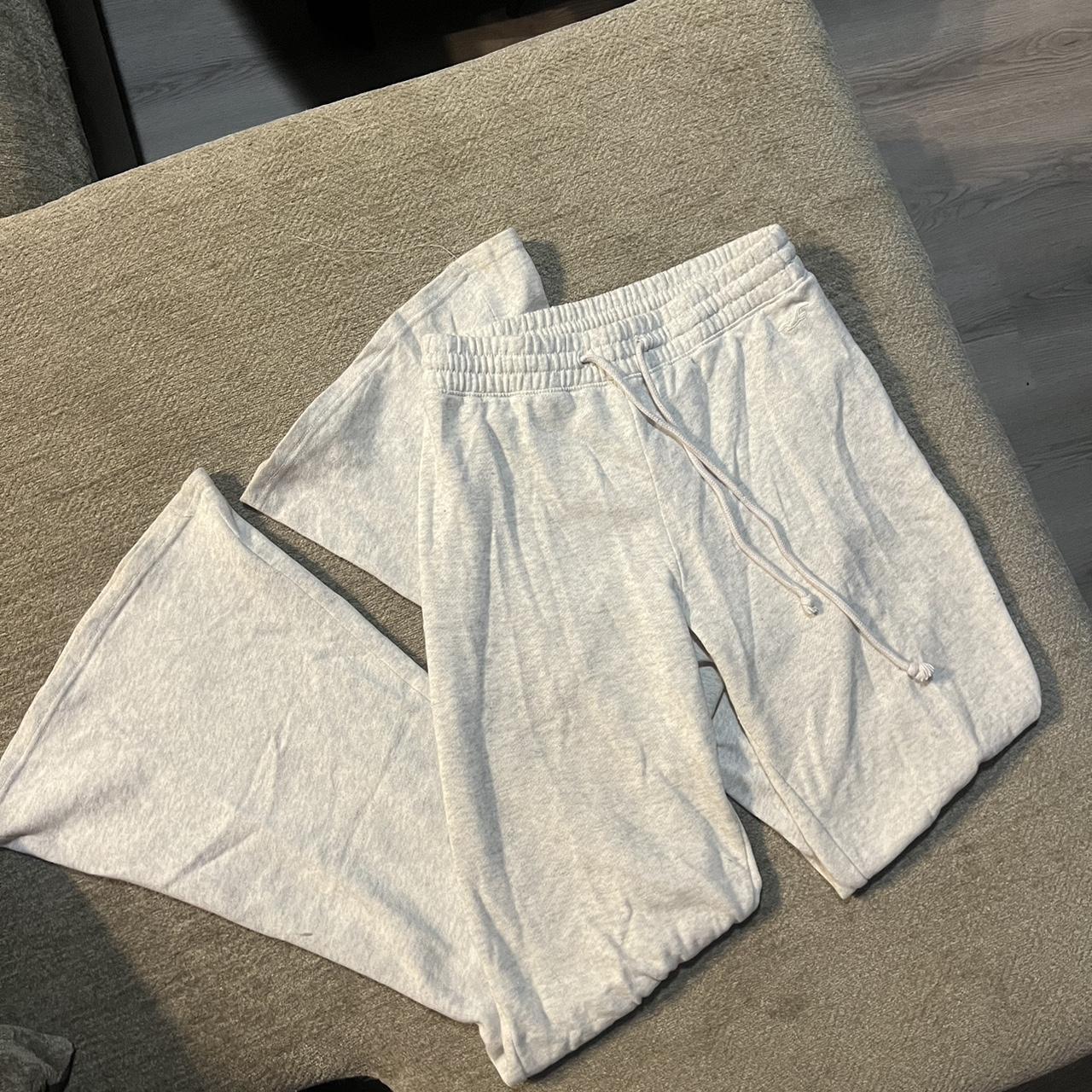 hollister light grey flare sweats can be worn as... - Depop