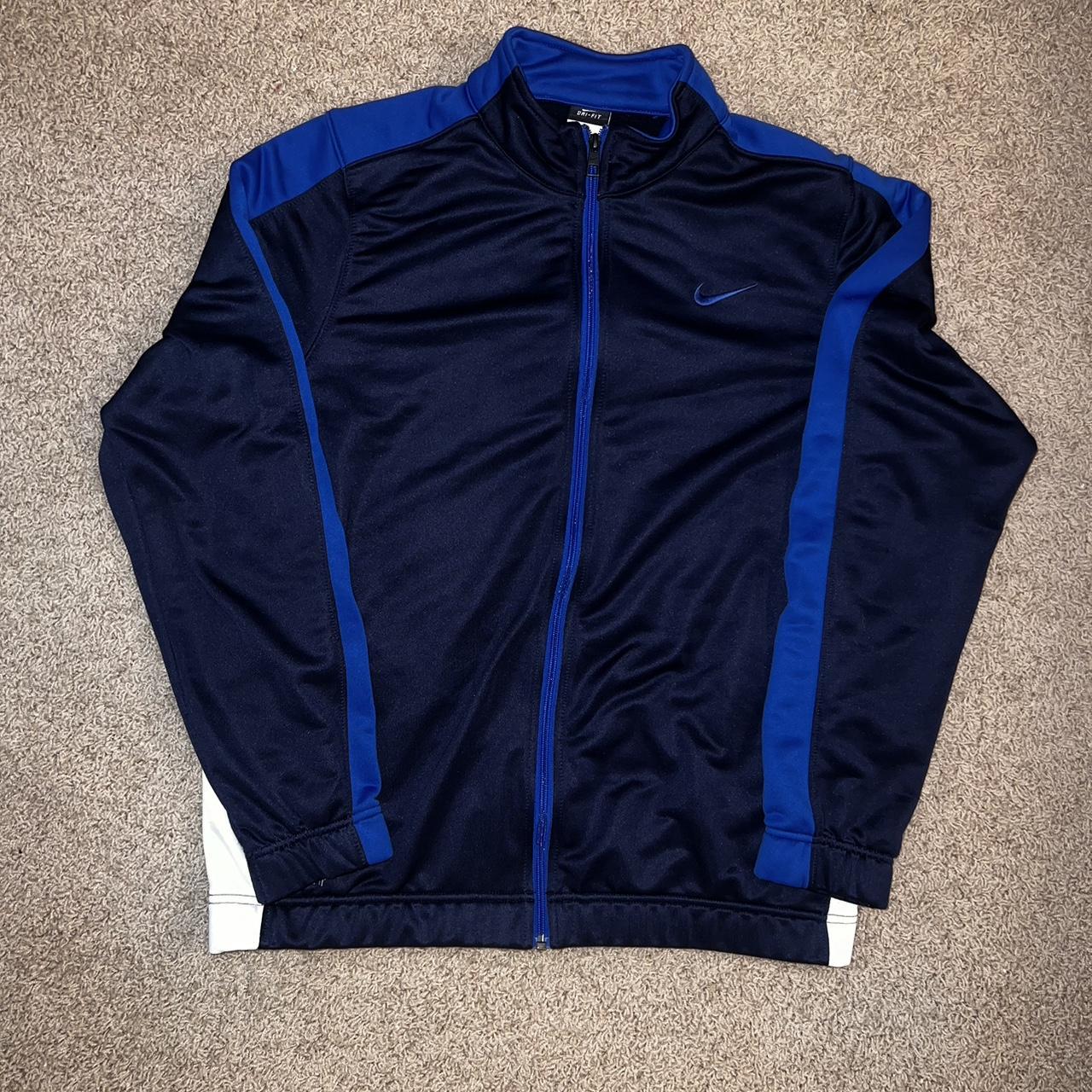 Blue and navy Nike zip-up jacket. Perfect for any... - Depop