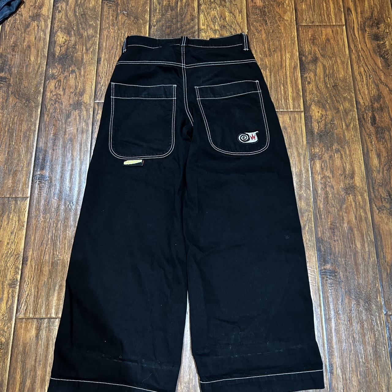 30x32 jncos black twin cannon Slight heeldrag but... | Depop