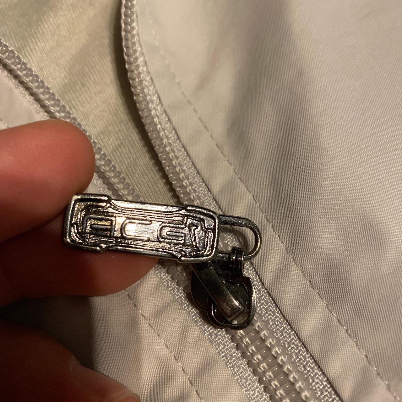 vintage ace Nike cream and black zip-up jacket... - Depop