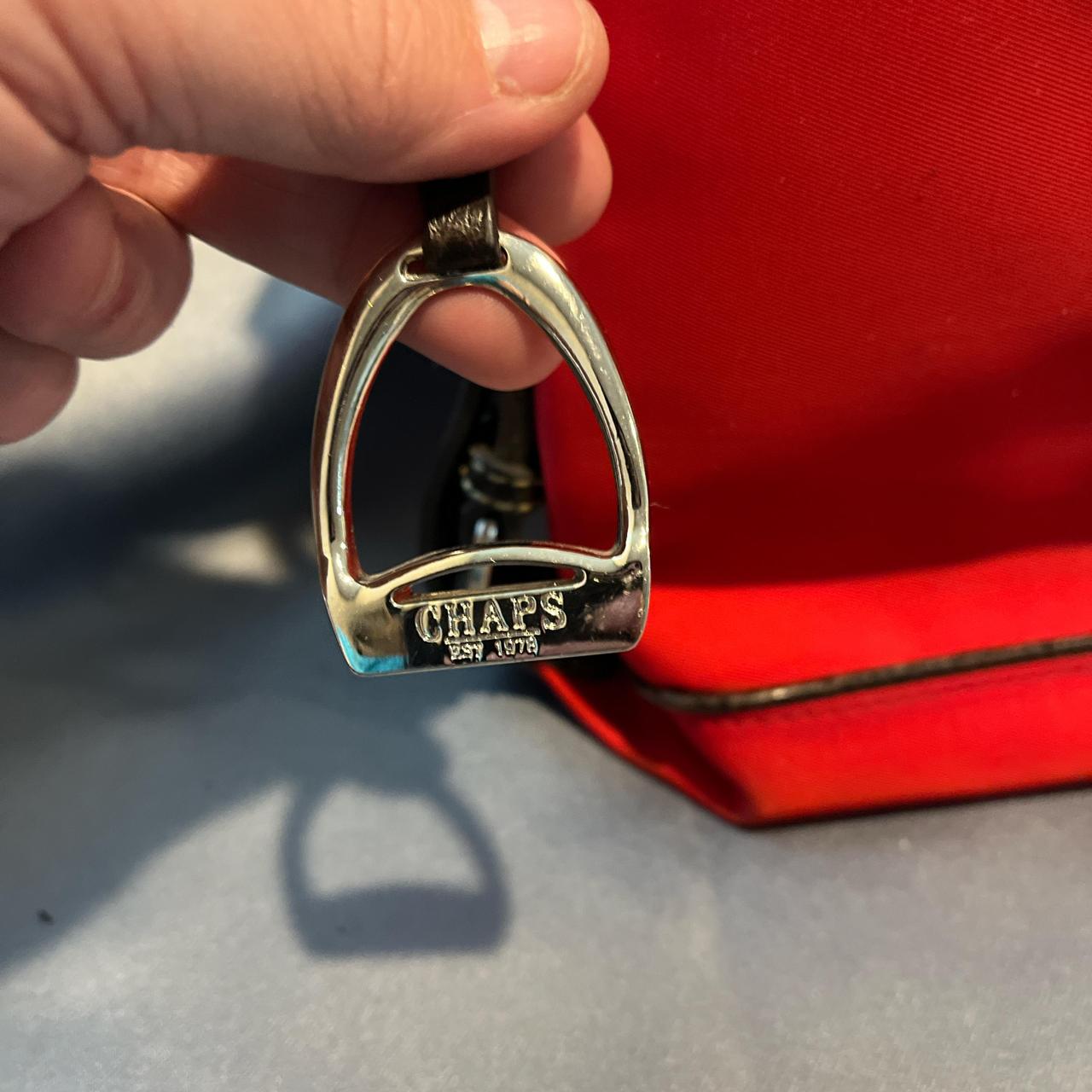 Chaps purse red in color with brown straps. No wear... - Depop